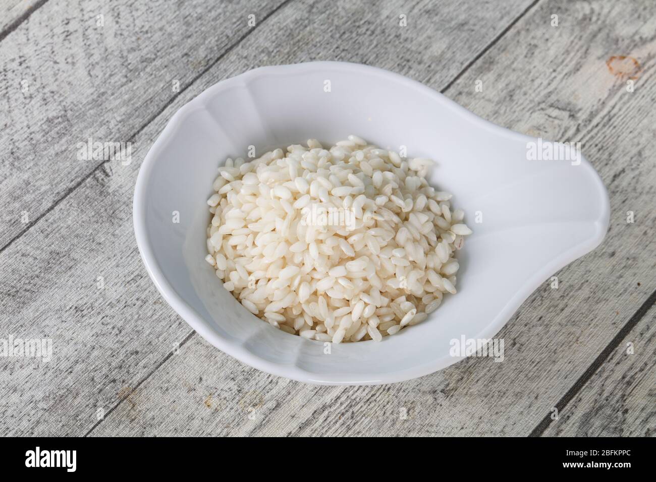 Raw Arborio rice for Italian risotto Stock Photo - Alamy