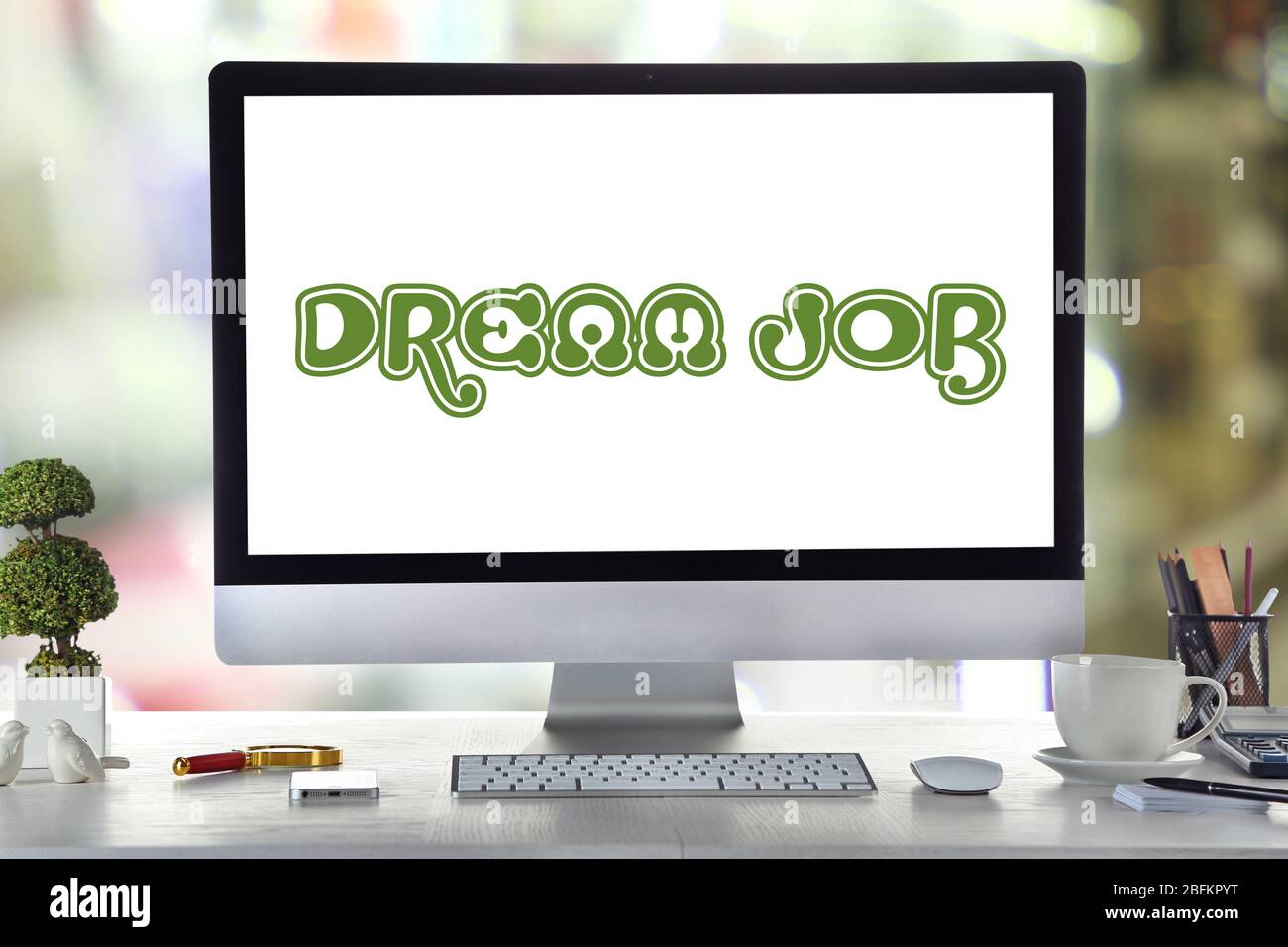 Dream job concept. Workplace with computer on table Stock Photo - Alamy