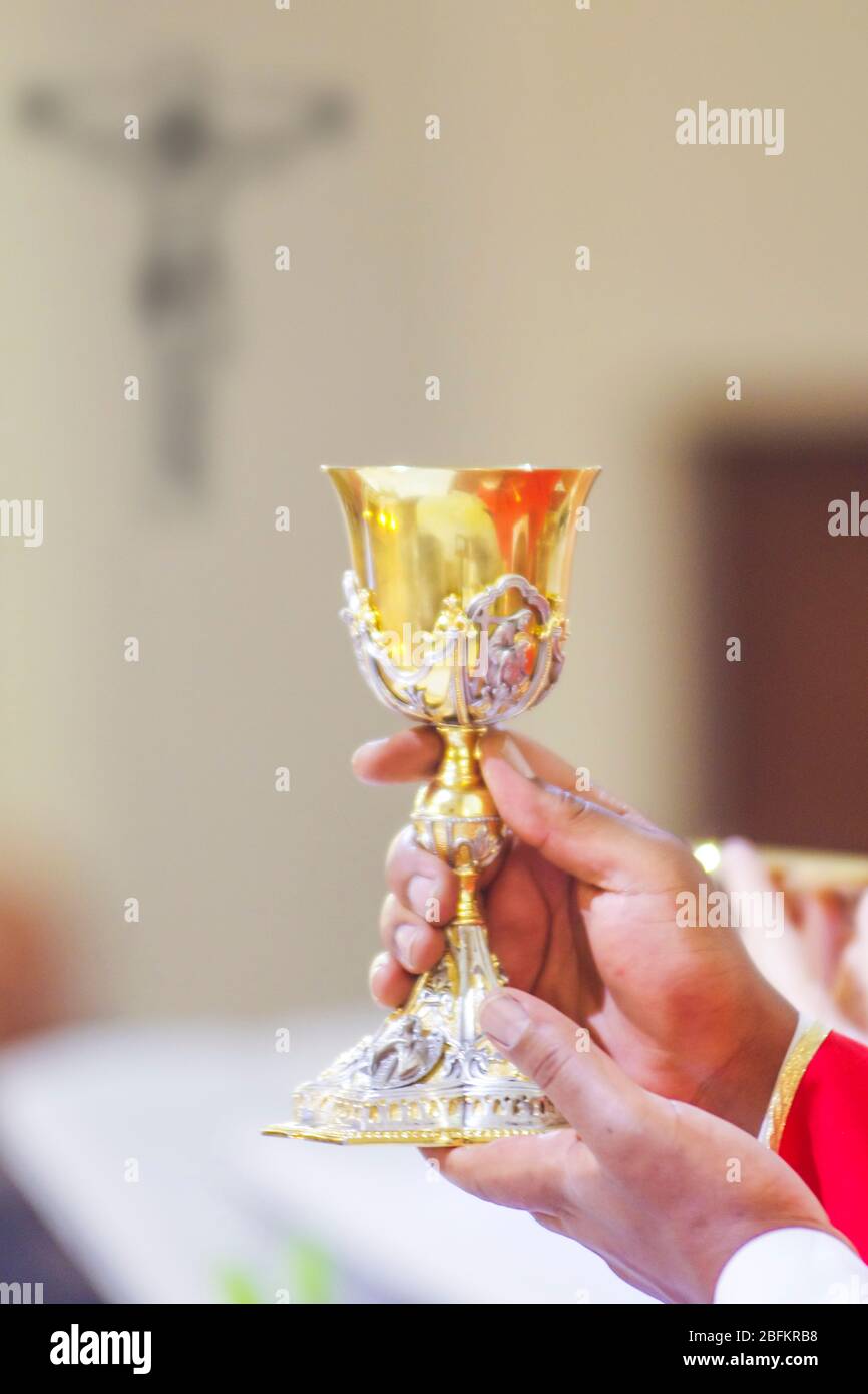 chalice with wine, consecrated in the blood of the risen Christ, ready ...