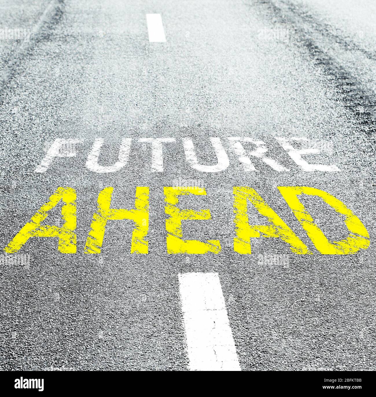 Future concept. Future ahead written on road Stock Photo - Alamy