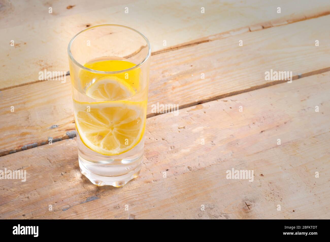 glass of water with lemon, closeup. Copy space Stock Photo - Alamy