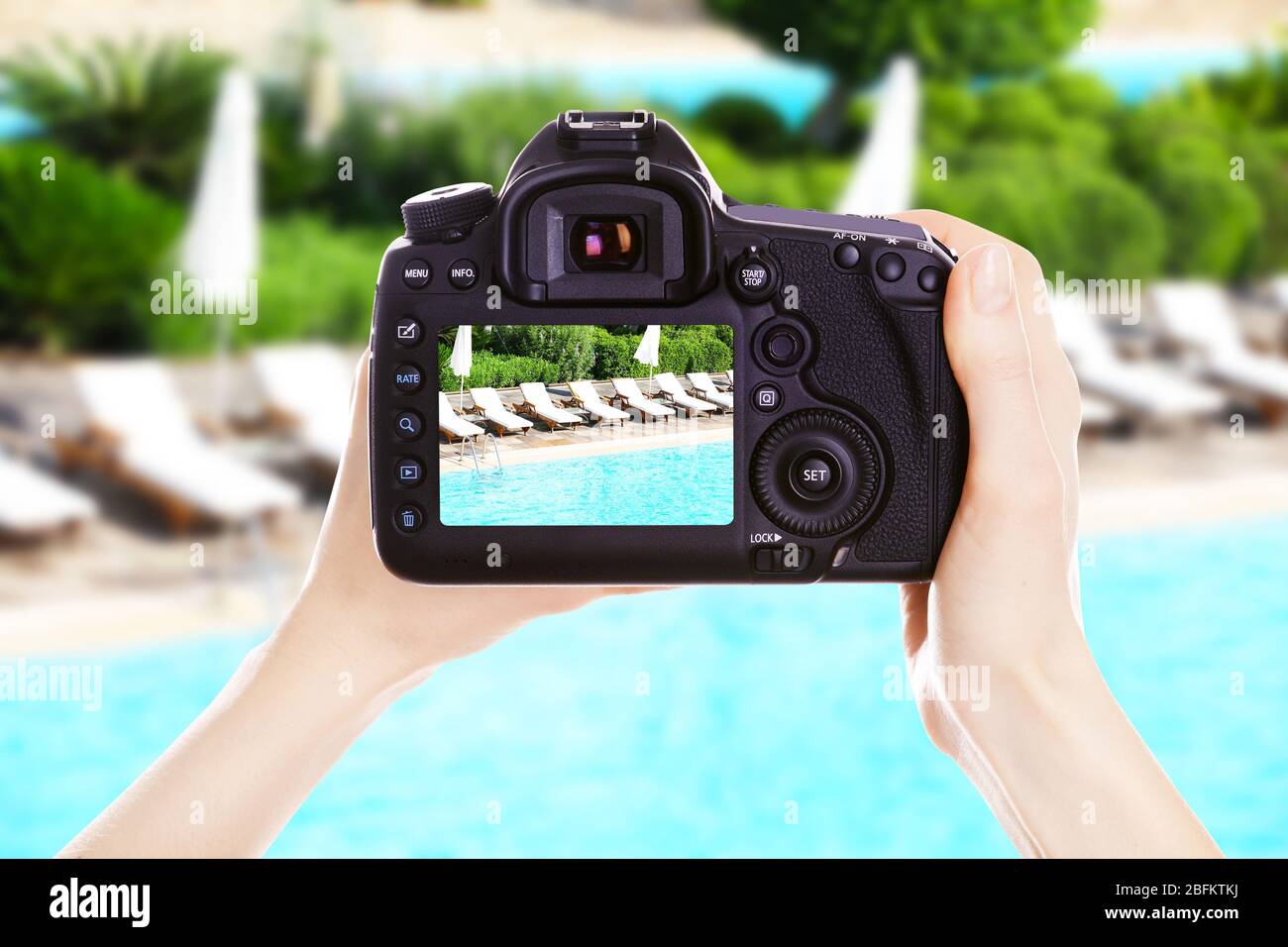 Photographer with camera at work Stock Photo - Alamy