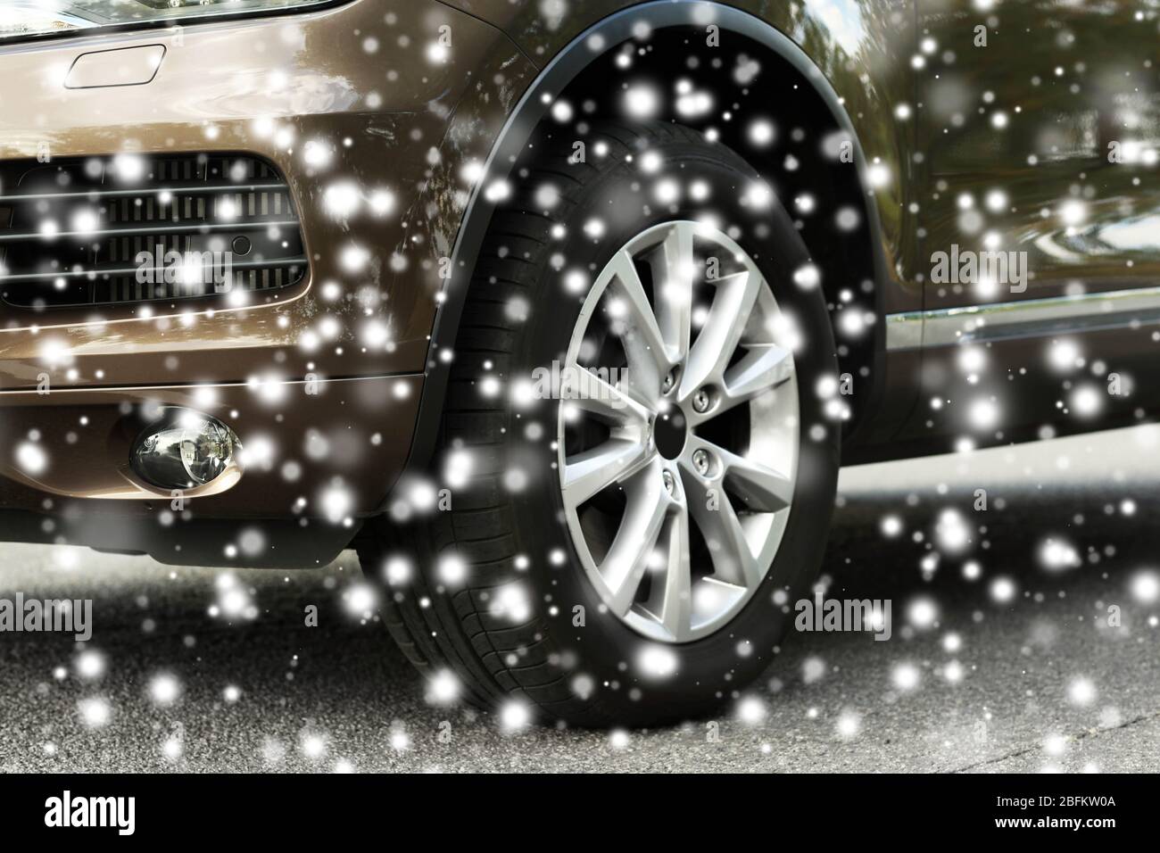 Car on road over snow effect Stock Photo - Alamy