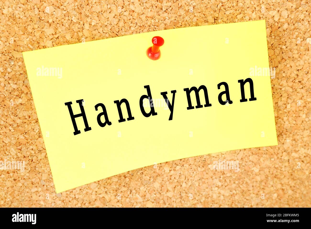 Word Handyman on piece of paper on billboard background Stock Photo - Alamy