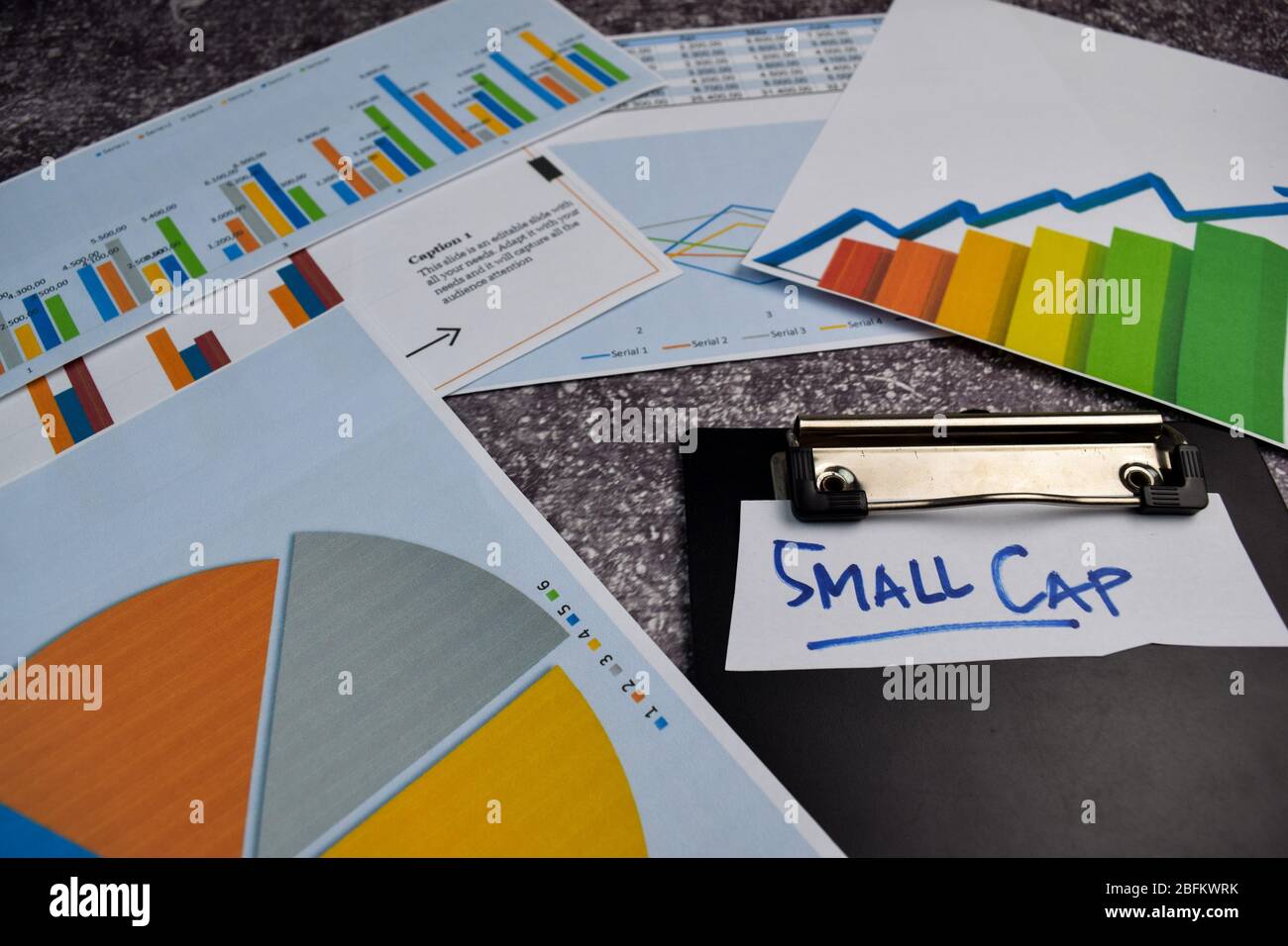 Small Cap write on sticky notes isolated on Office Desk. Stock market ...