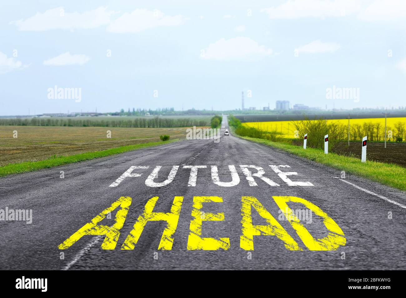 Future concept. Future ahead written on road Stock Photo - Alamy