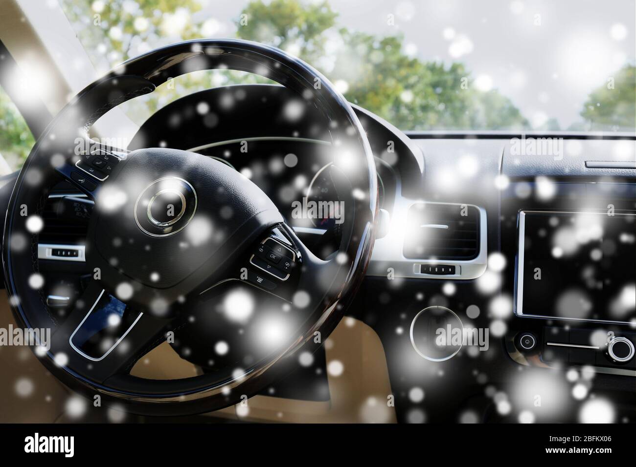 Modern car interior. Steering wheel over snow effect Stock Photo - Alamy