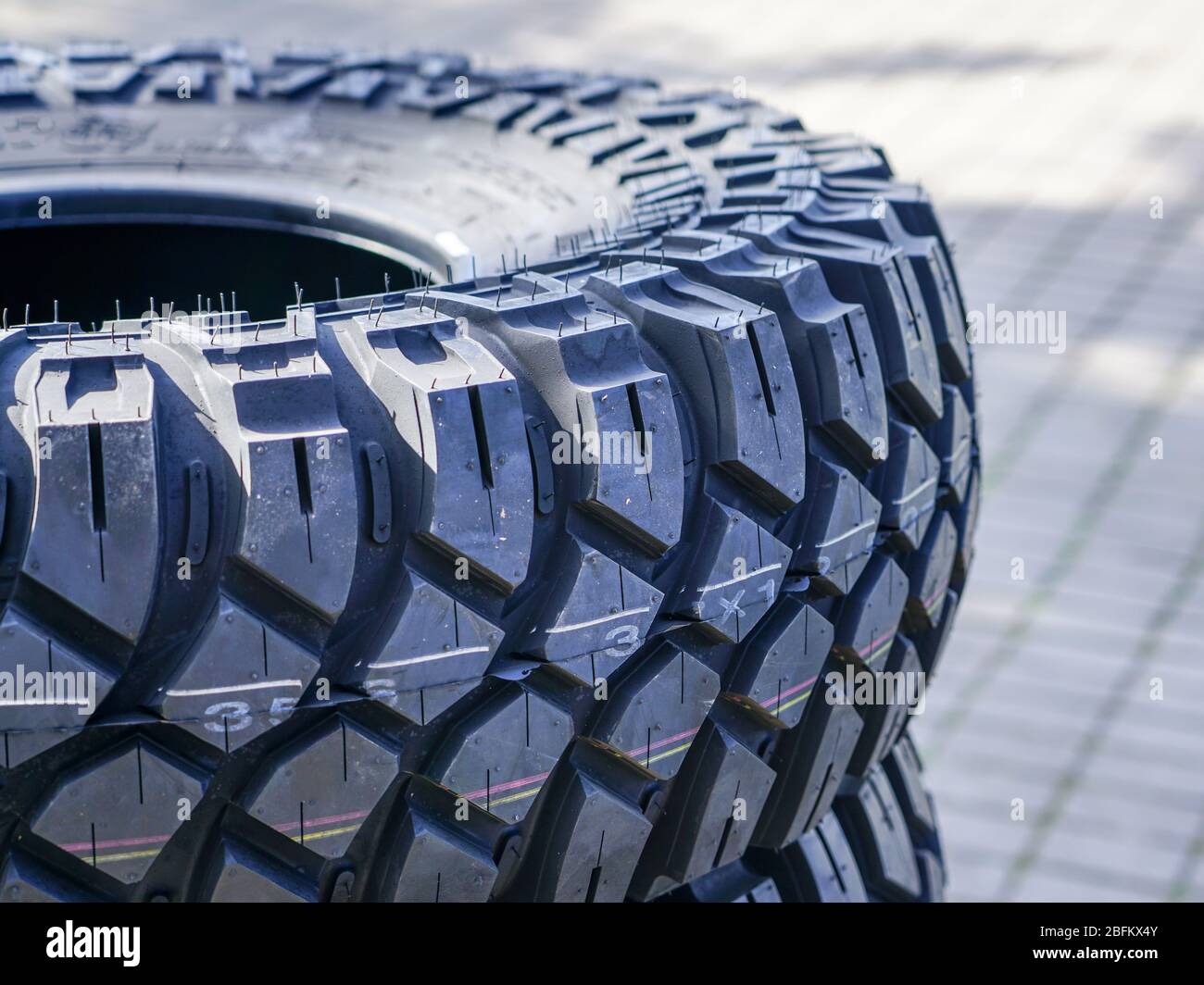 closeup view of new mud and terrain tire tread Stock Photo - Alamy