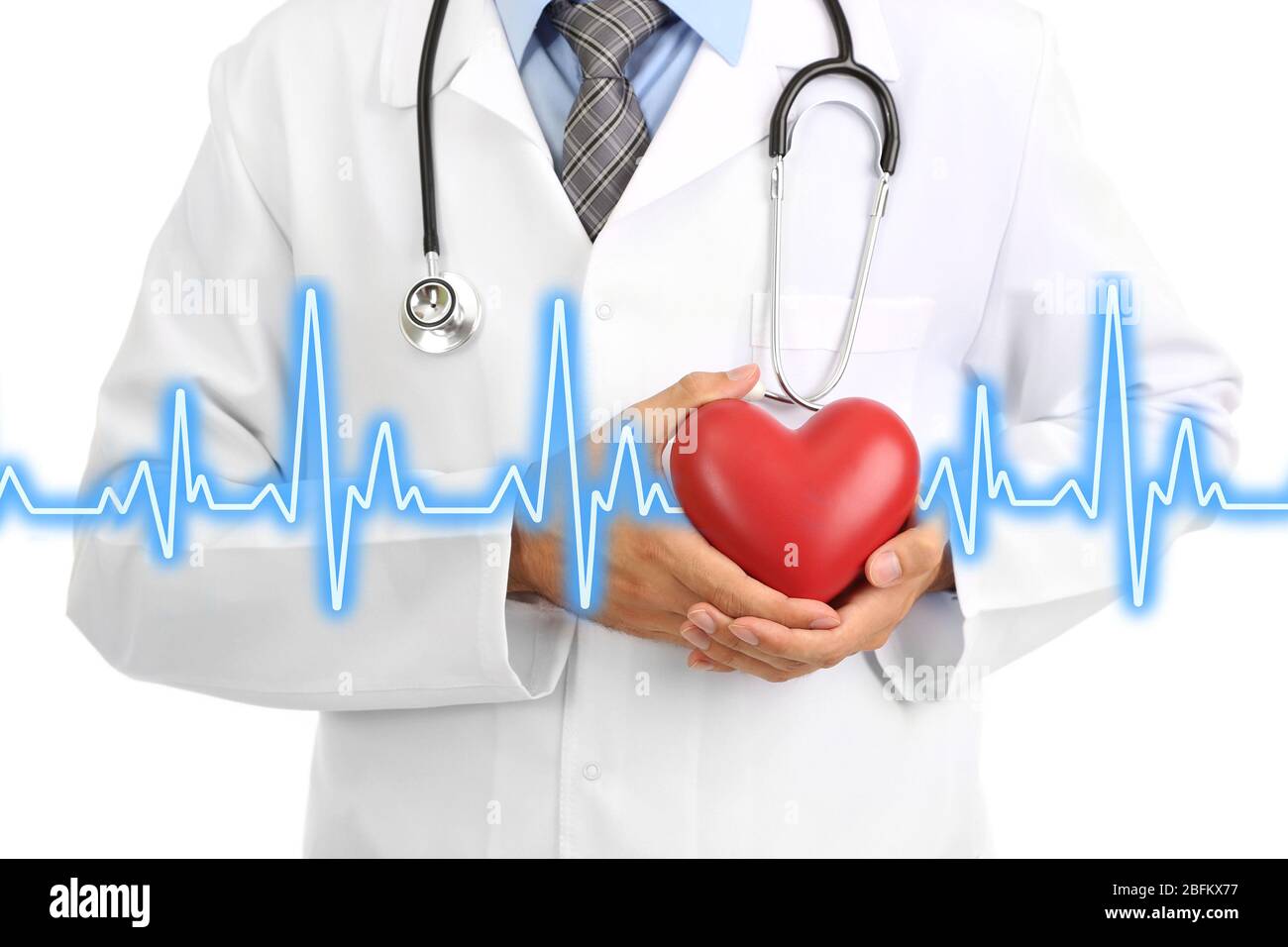 Medical doctor holding heart Stock Photo - Alamy