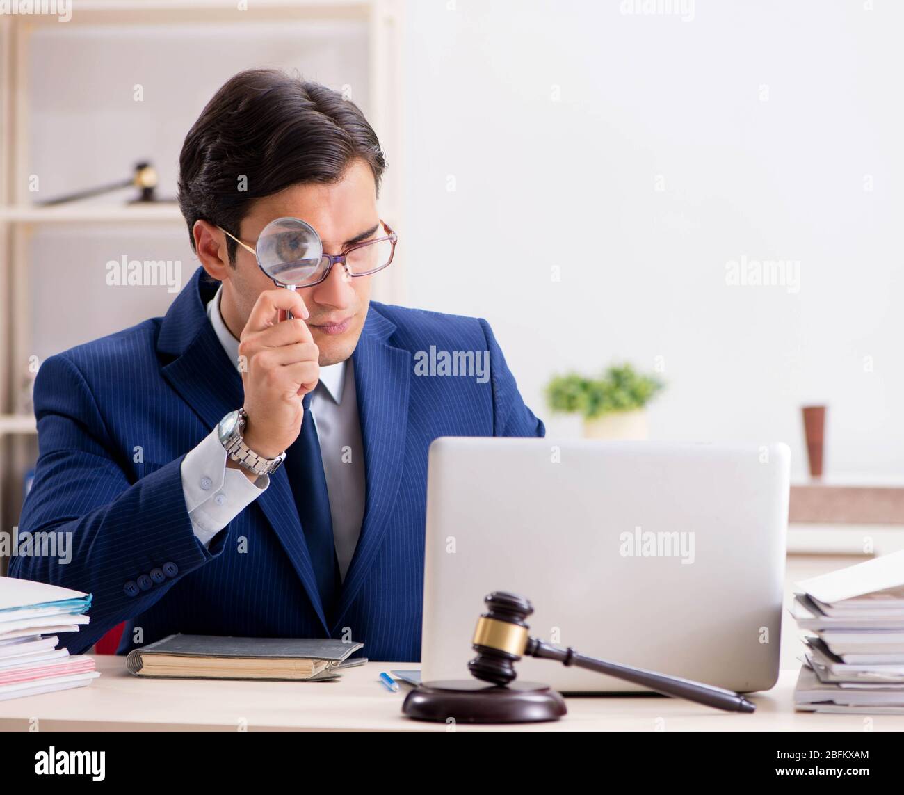 The young handsome judge working in court Stock Photo - Alamy
