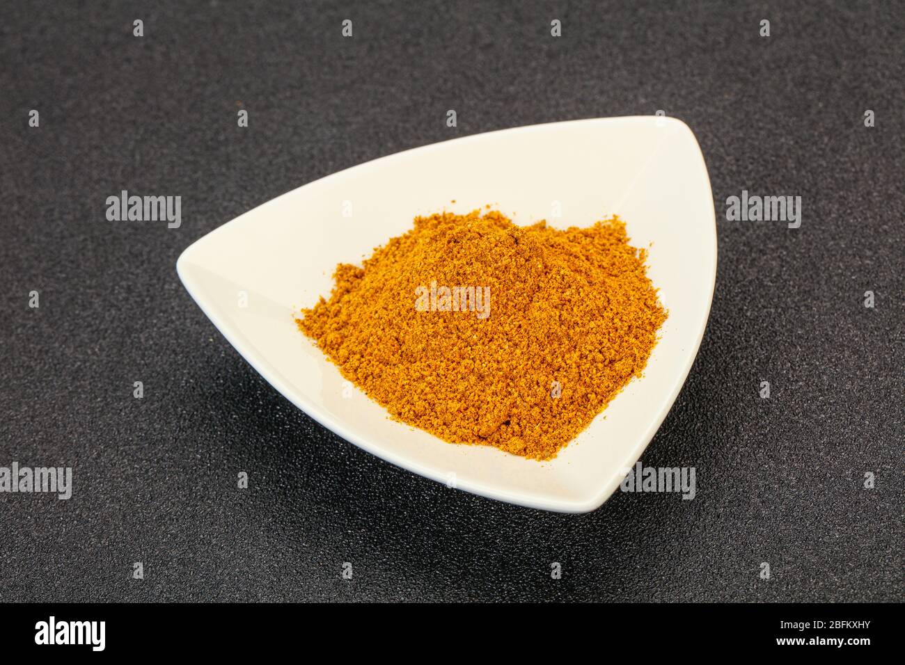 Indian traditional spices - Curry powder in the bowl Stock Photo - Alamy