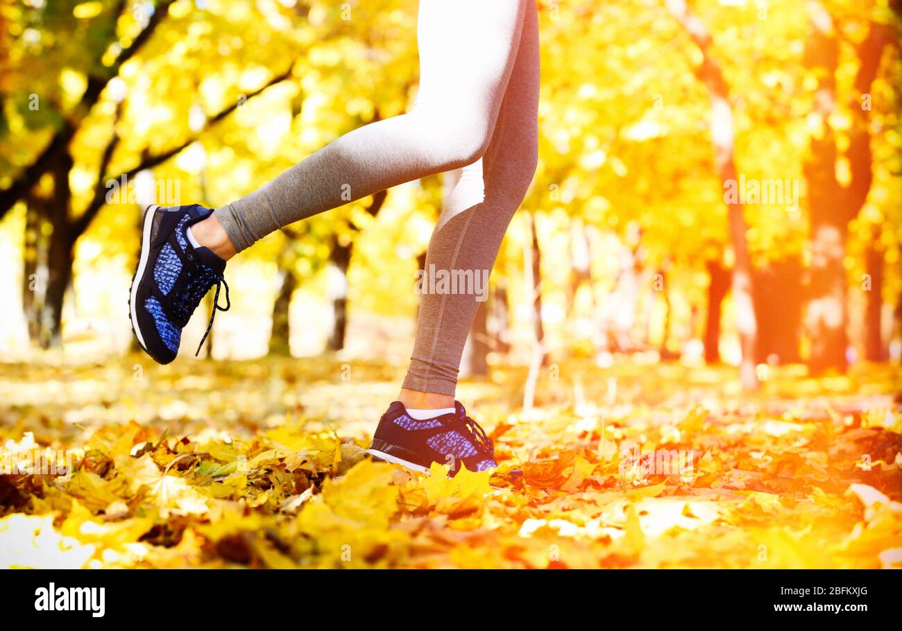Runner legs outside during autumn day Stock Photo - Alamy