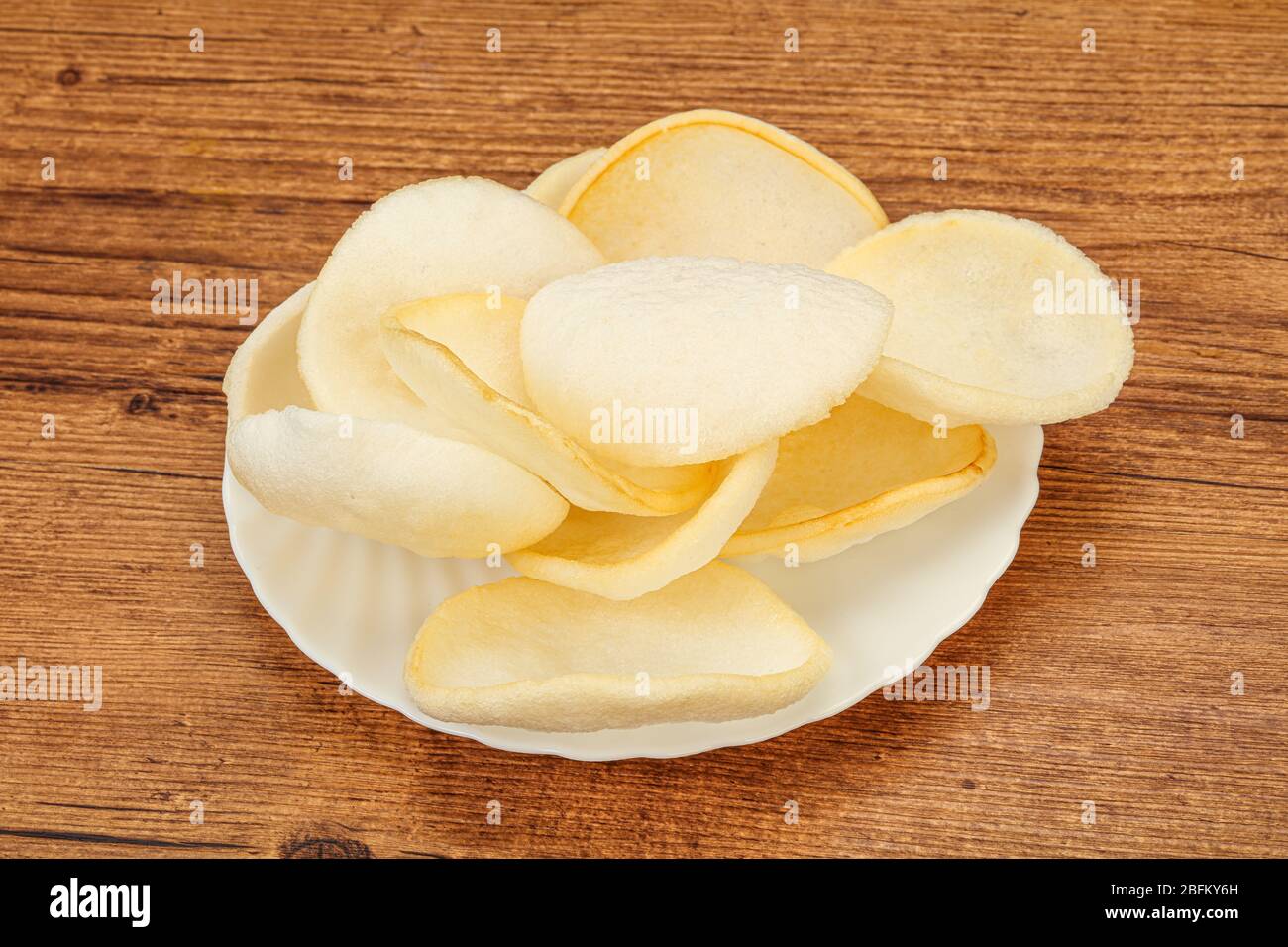 Asian cusine - homemade prawn chips in the bowl Stock Photo - Alamy