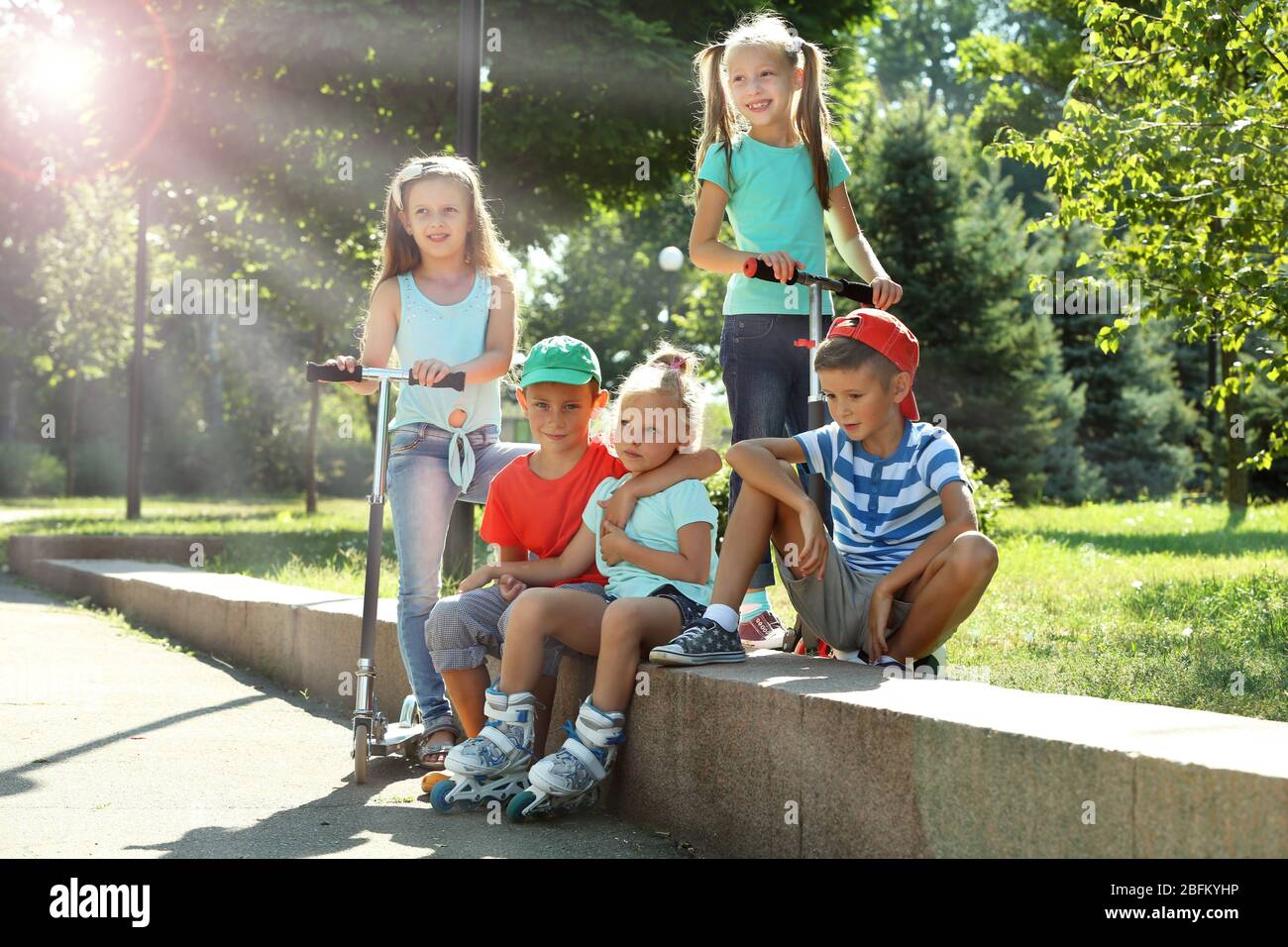Happy active children in park Stock Photo - Alamy