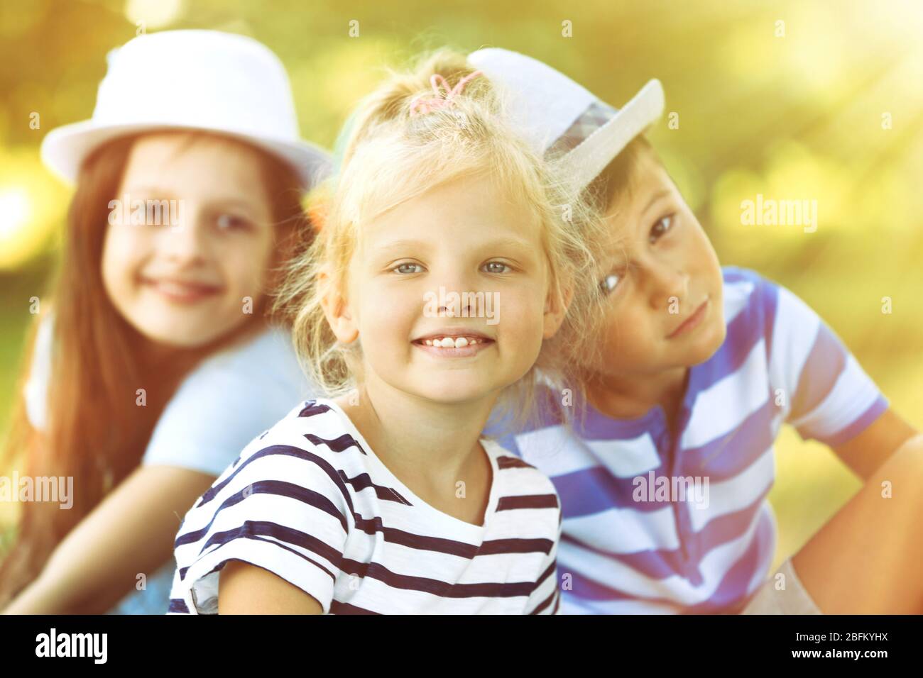Happy active children outdoors Stock Photo - Alamy