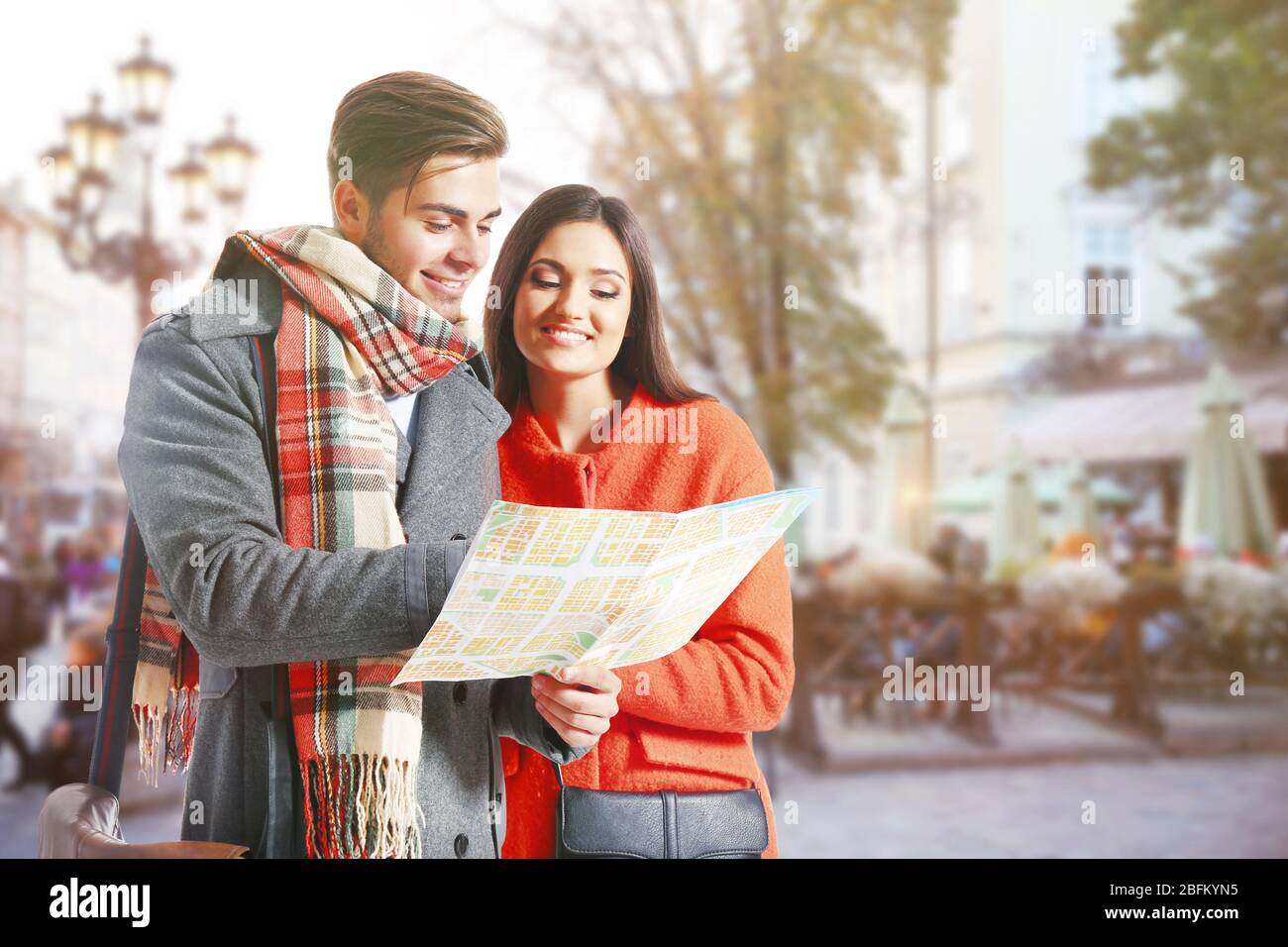 Happy couple walking outdoors Stock Photo - Alamy