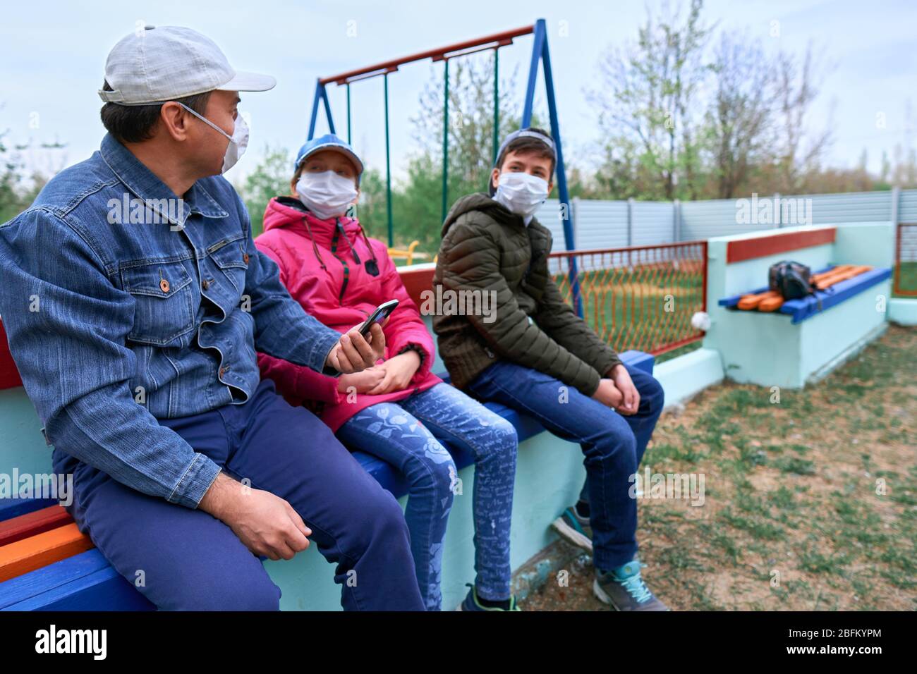 Father protects family hi-res stock photography and images - Alamy