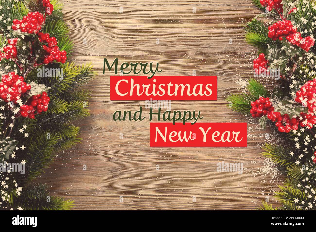 Christmas fir tree branches with rowan on wooden table Stock Photo - Alamy