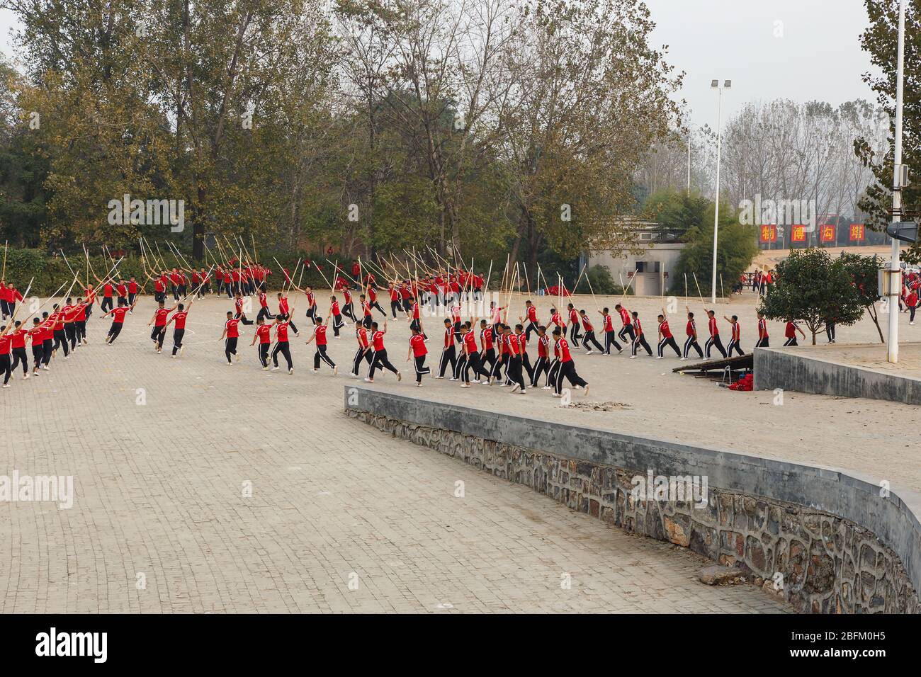 Dengfeng, China - October 16, 2018: Training students of the martial ...