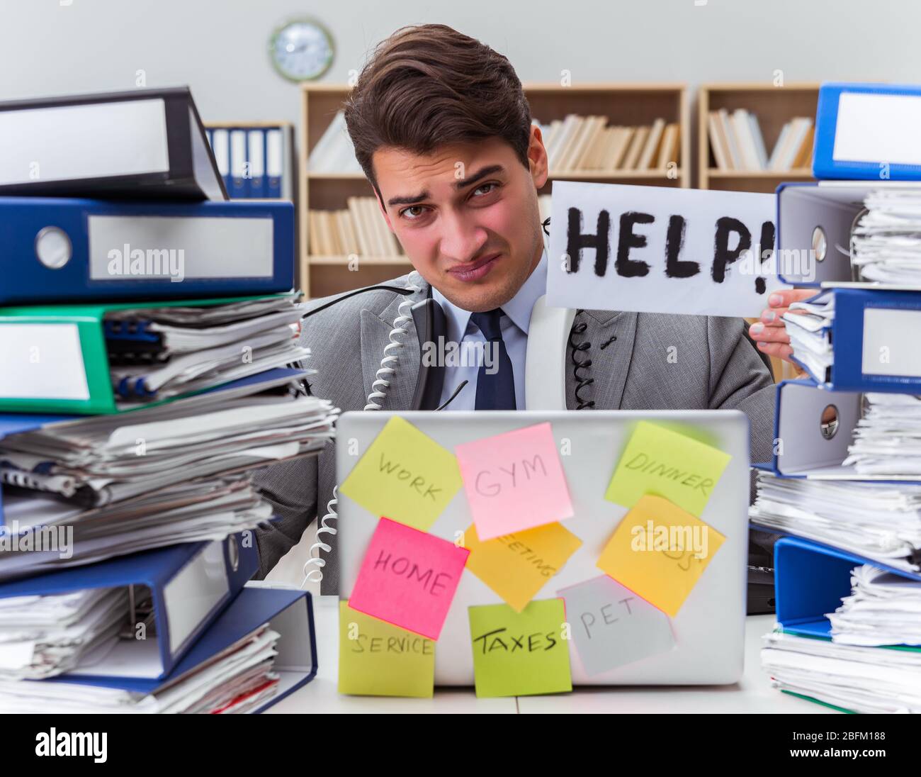 The busy businessman asking for help with work Stock Photo - Alamy