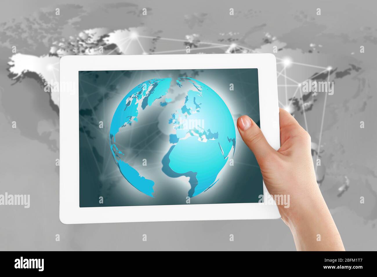 Human holding tablet pc with world map and network on screen Stock ...