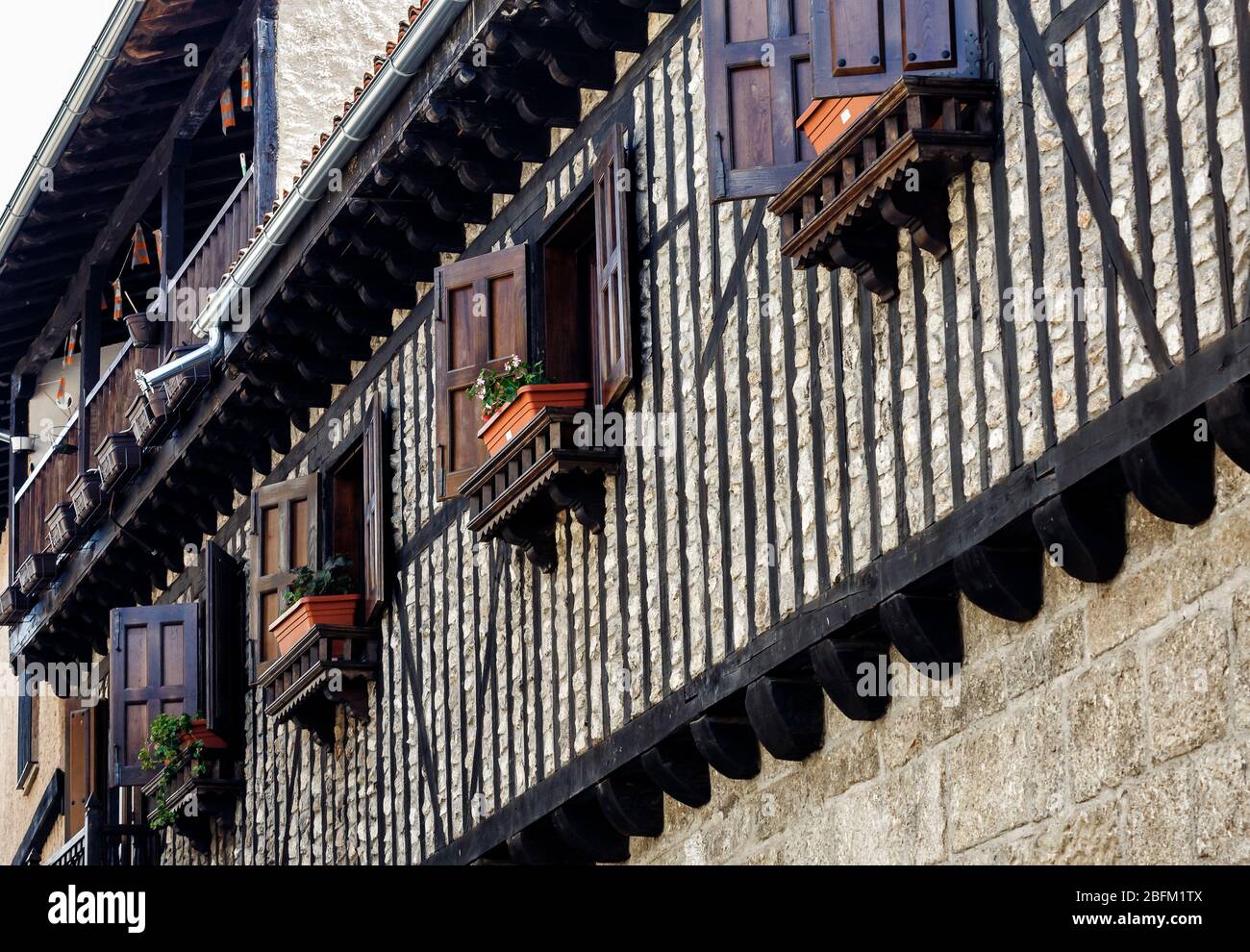 Wooden balcony geraniums hi-res stock photography and images - Alamy