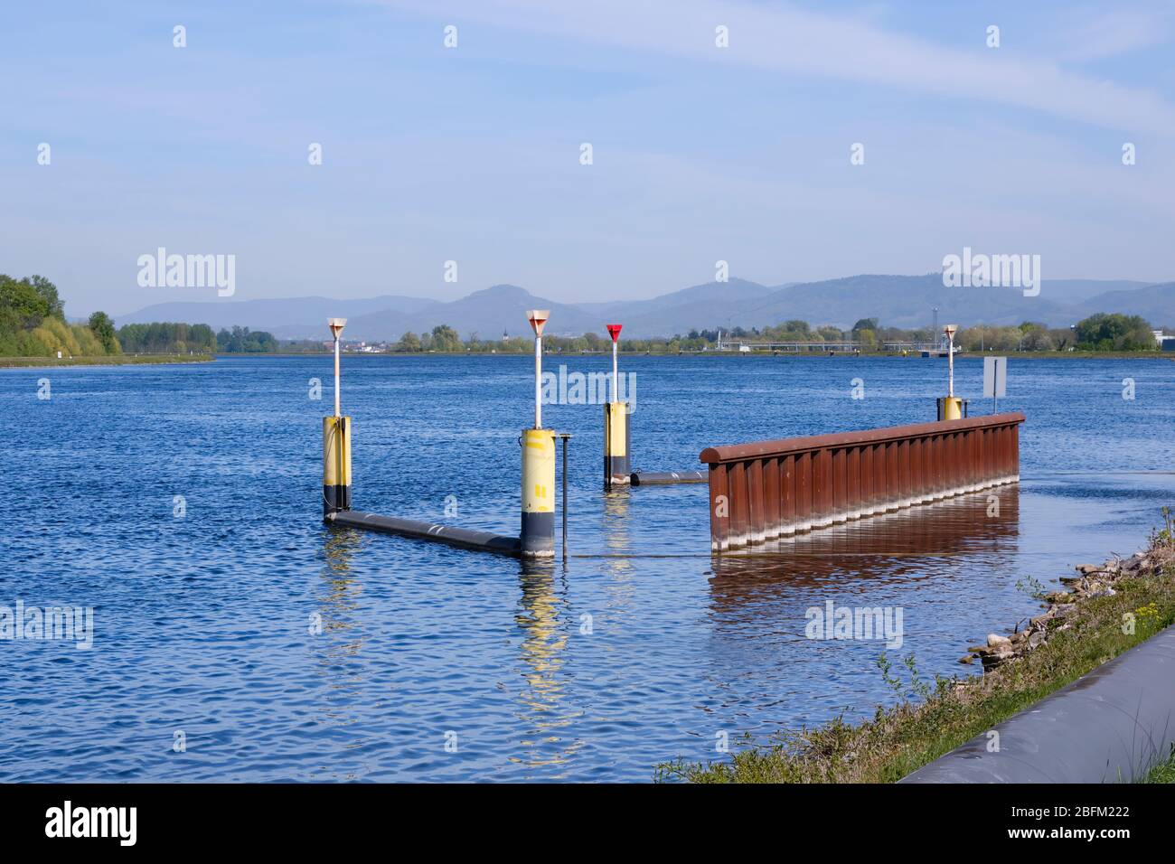 warning sign, flood protection in the river Rhine, Germany Stock Photo ...