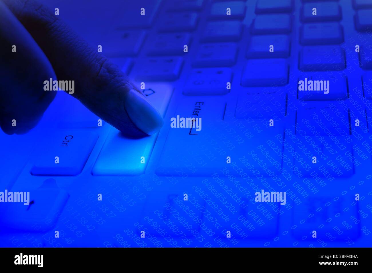 Computer keyboard with program code Stock Photo - Alamy