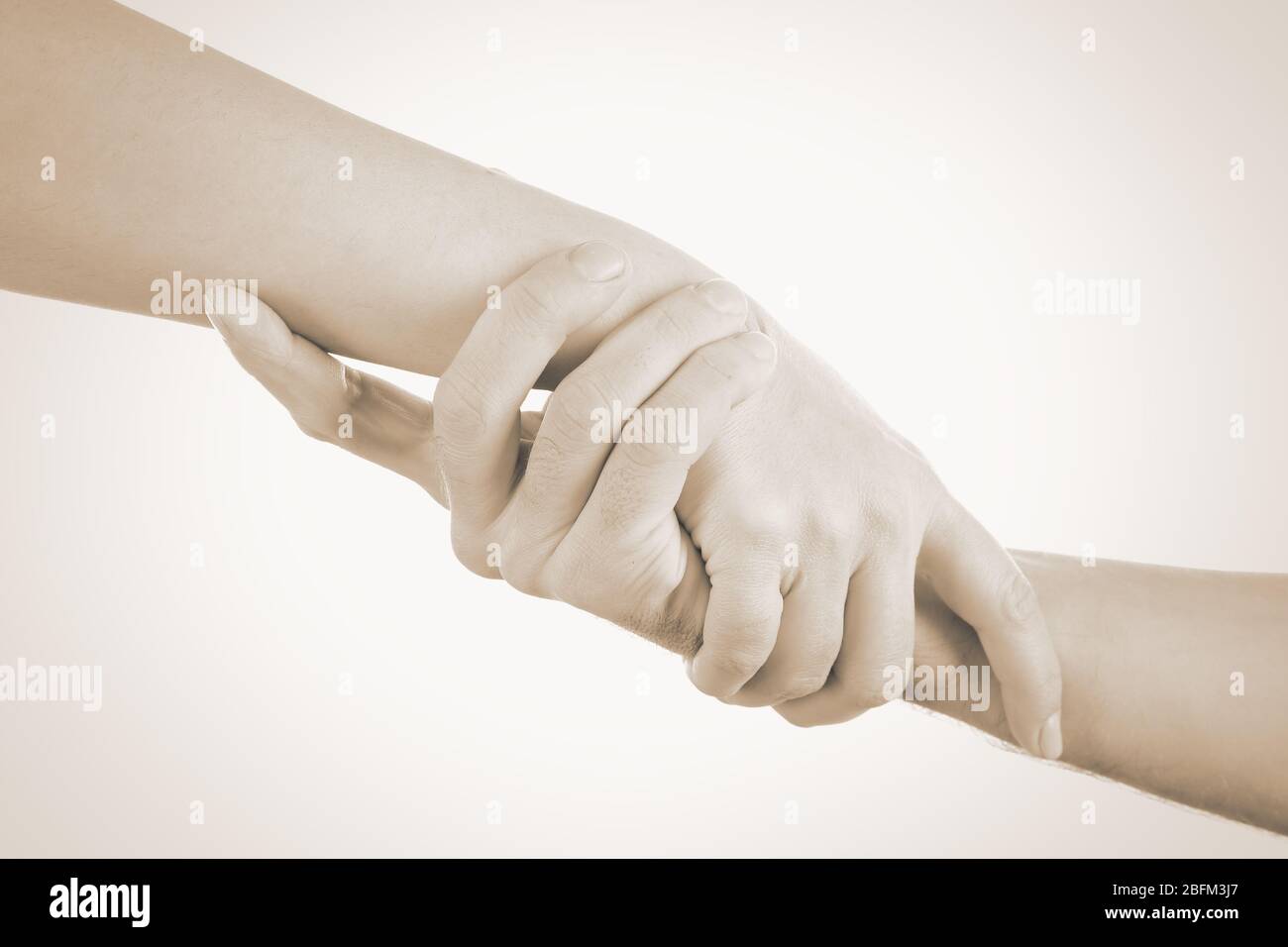 Two hands reaching toward each other. Helping concept. Vintage tone ...