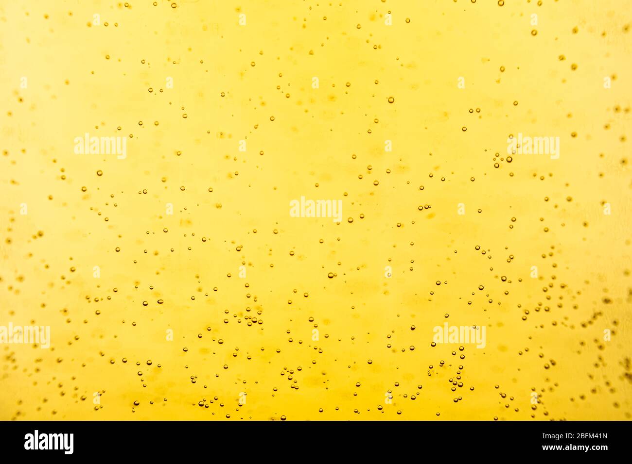 Texture of gas bubbles in light beer. Abstract background for design ...