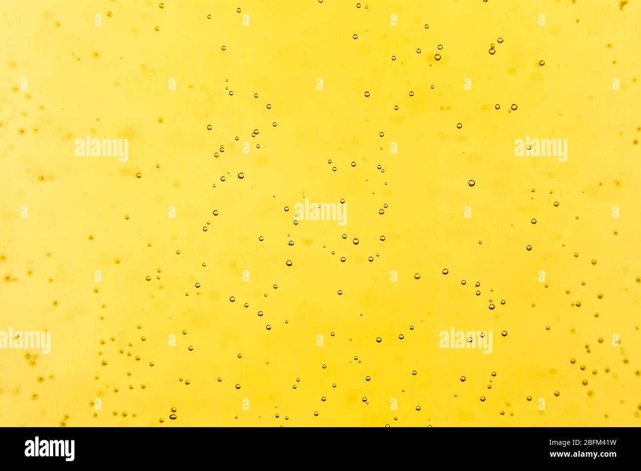 Texture of gas bubbles in light beer. Abstract backdrop for design ...