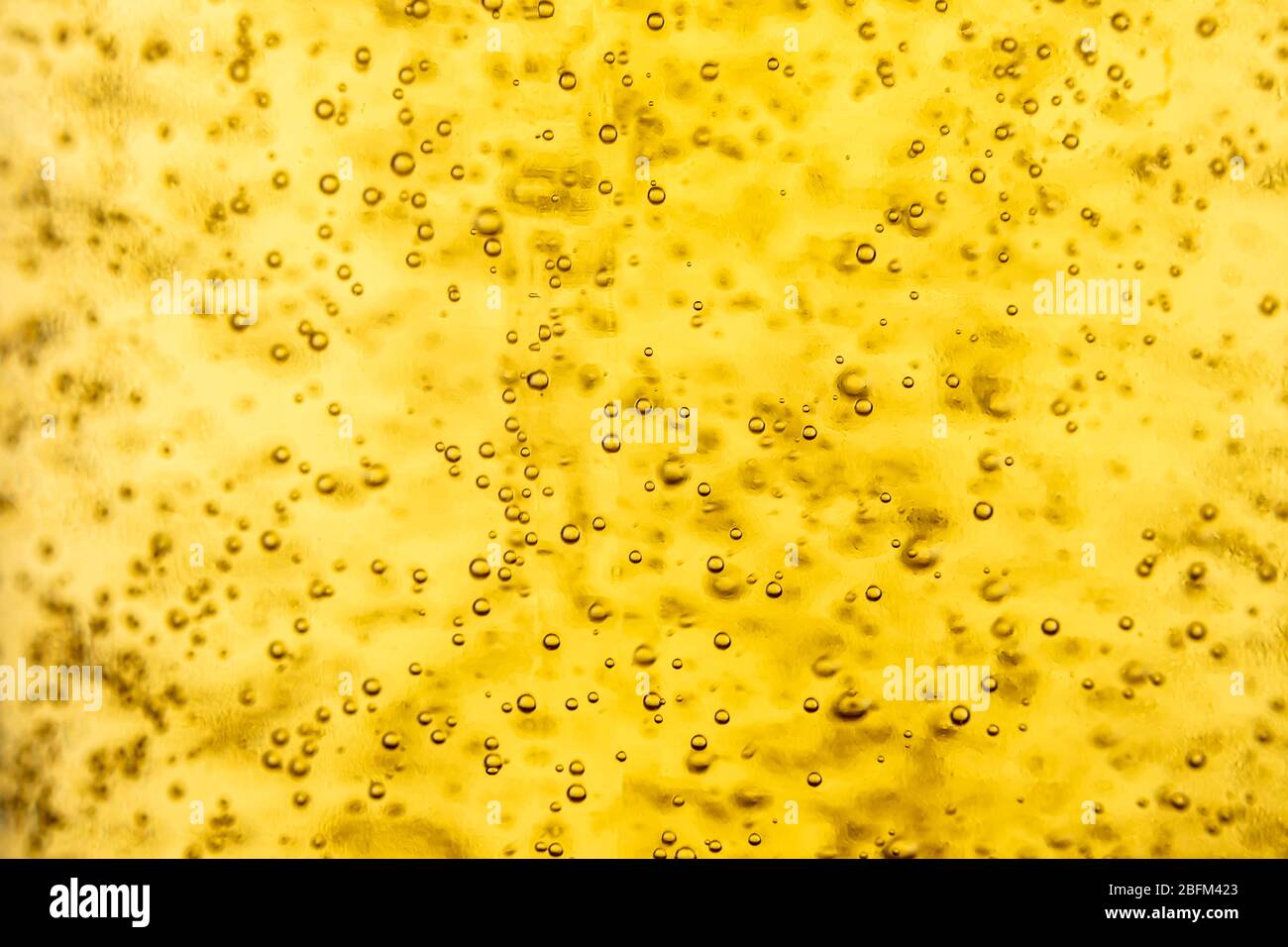 Texture of gas bubbles in light beer. Abstract background for design ...