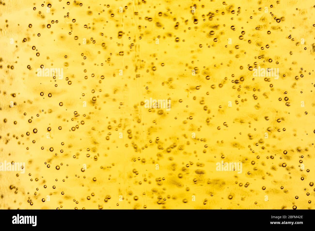 Texture of gas bubbles in light beer. Abstract background for design ...