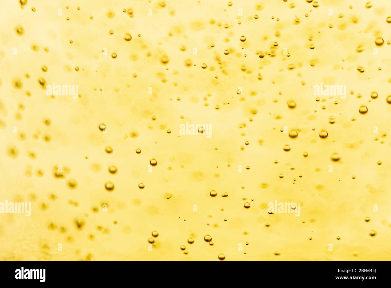 Texture of gas bubbles in light beer. Abstract backdrop for design ...