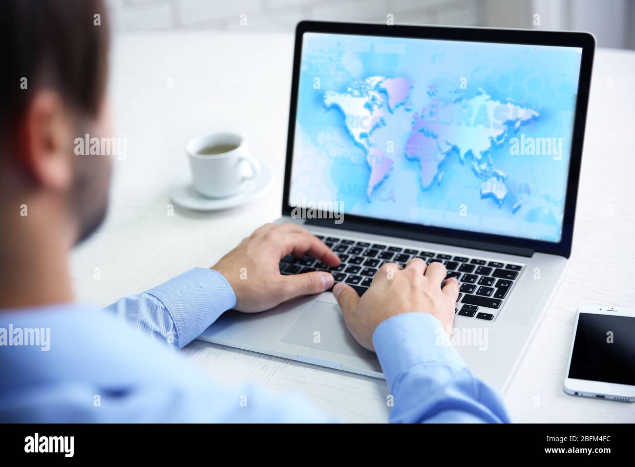 Human working with laptop, with world map and network on screen Stock ...