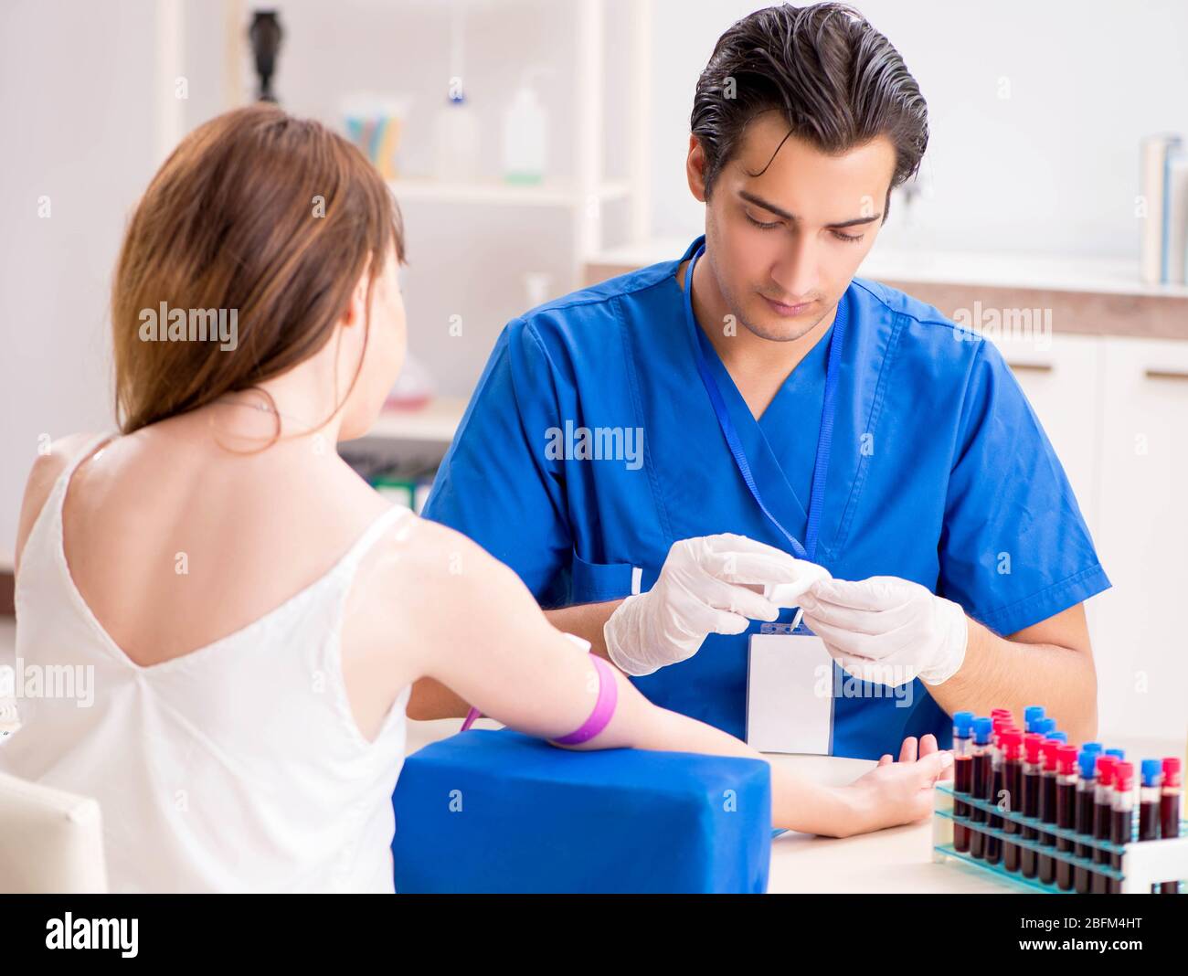 The young patient during blood test sampling procedure Stock Photo - Alamy