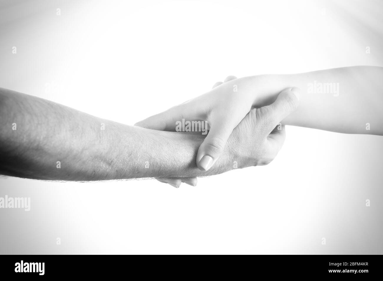 Two hands reaching toward each other. Helping concept. Vintage tone ...