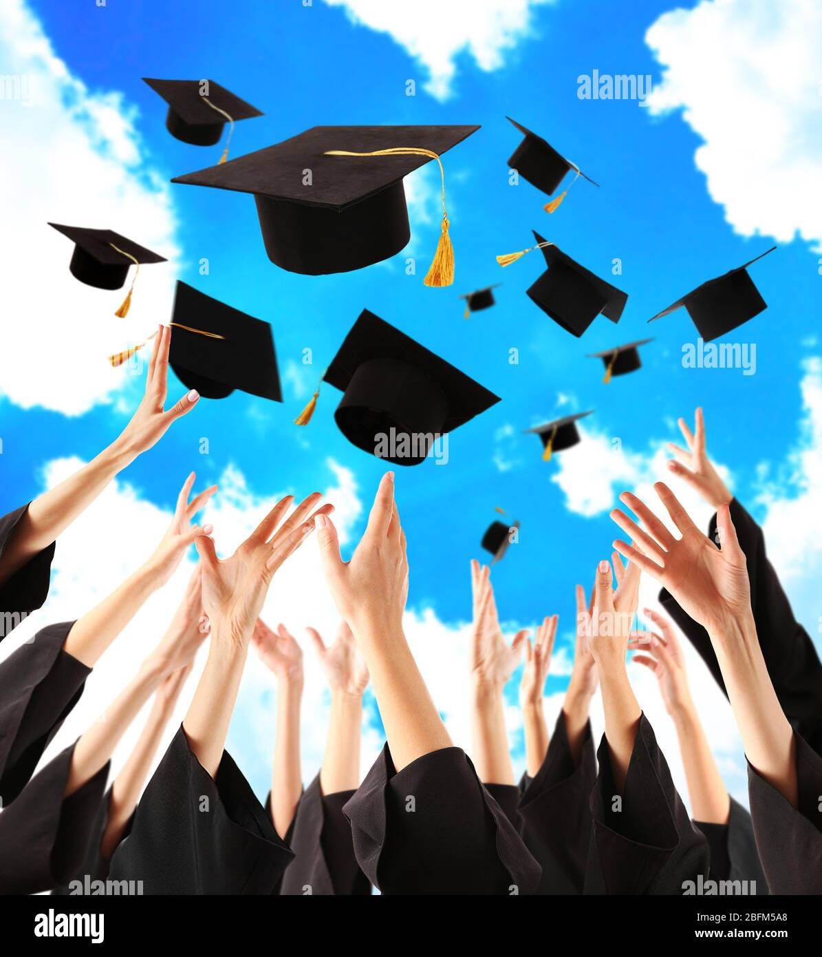 Graduation cap throwing hands hi-res stock photography and images - Alamy