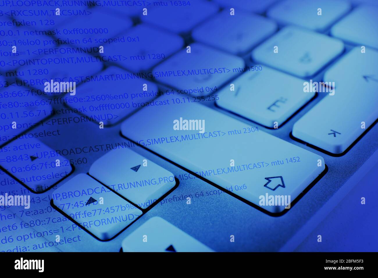 Computer keyboard with program code Stock Photo - Alamy