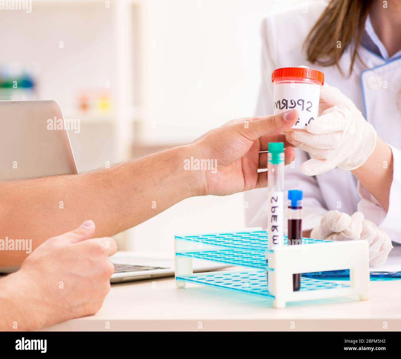 The male sperm donor visiting clinic Stock Photo - Alamy