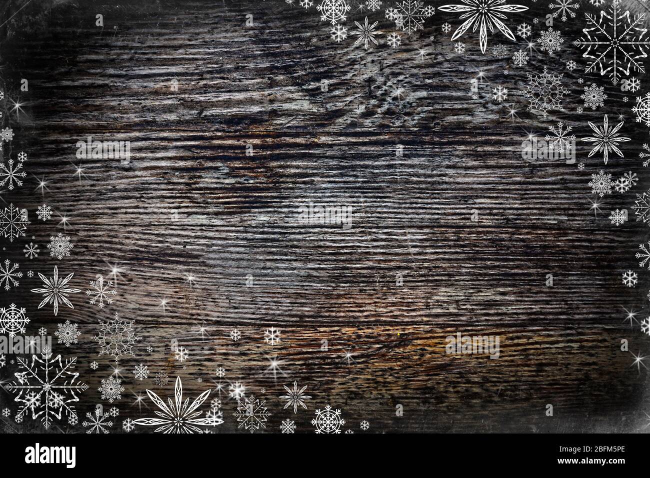 Winter background with snowflakes on wooden texture Stock Photo - Alamy