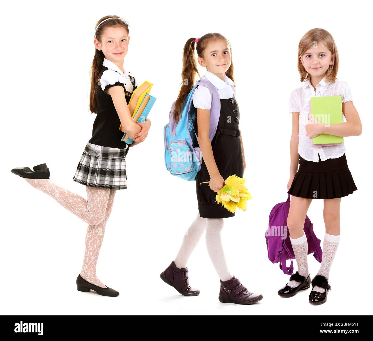 Cute happy schoolgirls, isolated on white Stock Photo - Alamy