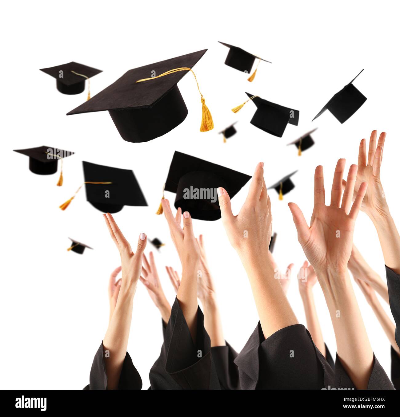 Graduates hands throwing graduation hats , isolated on white Stock ...