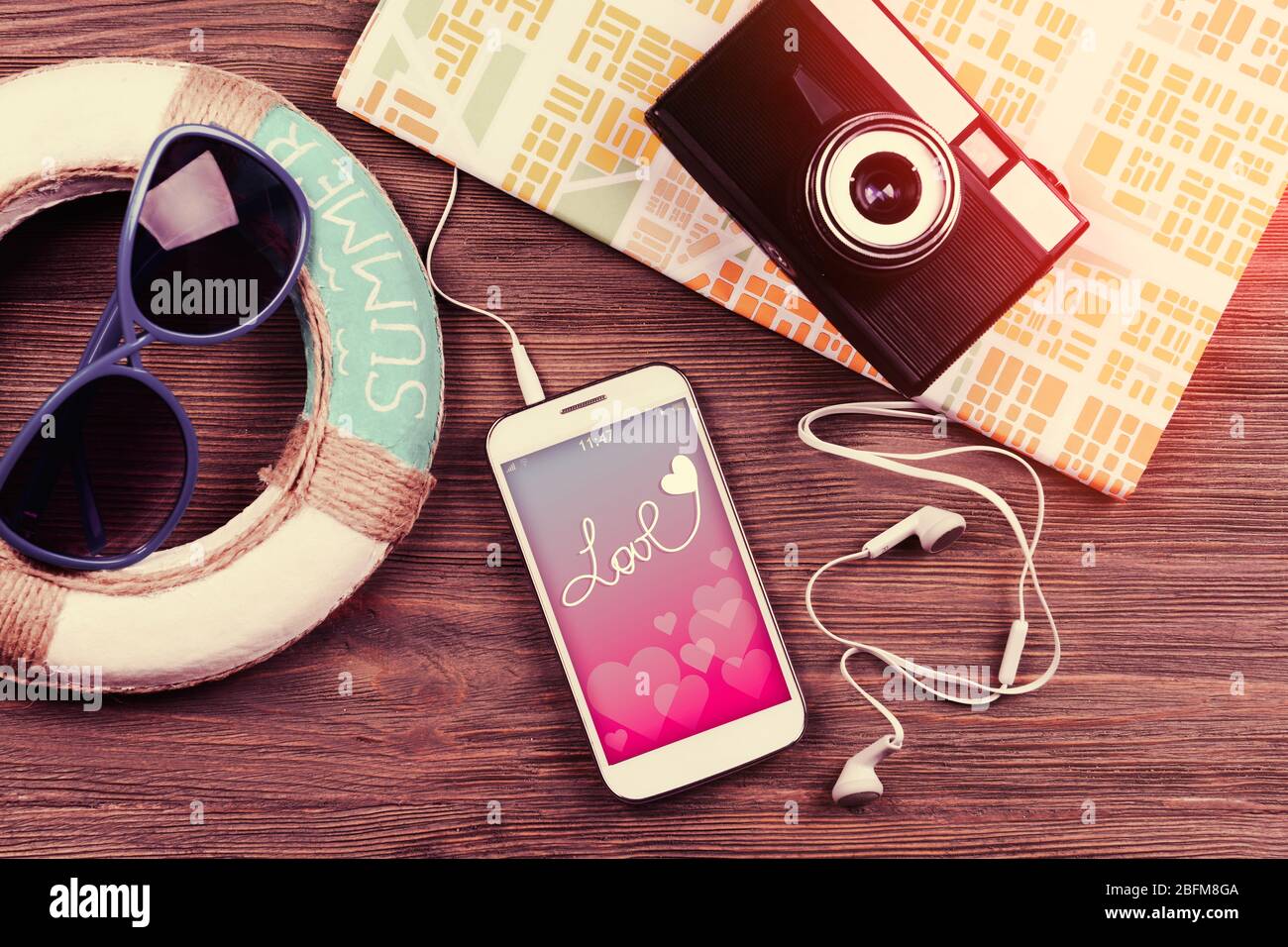 Smart phone with romantic screensaver Stock Photo - Alamy