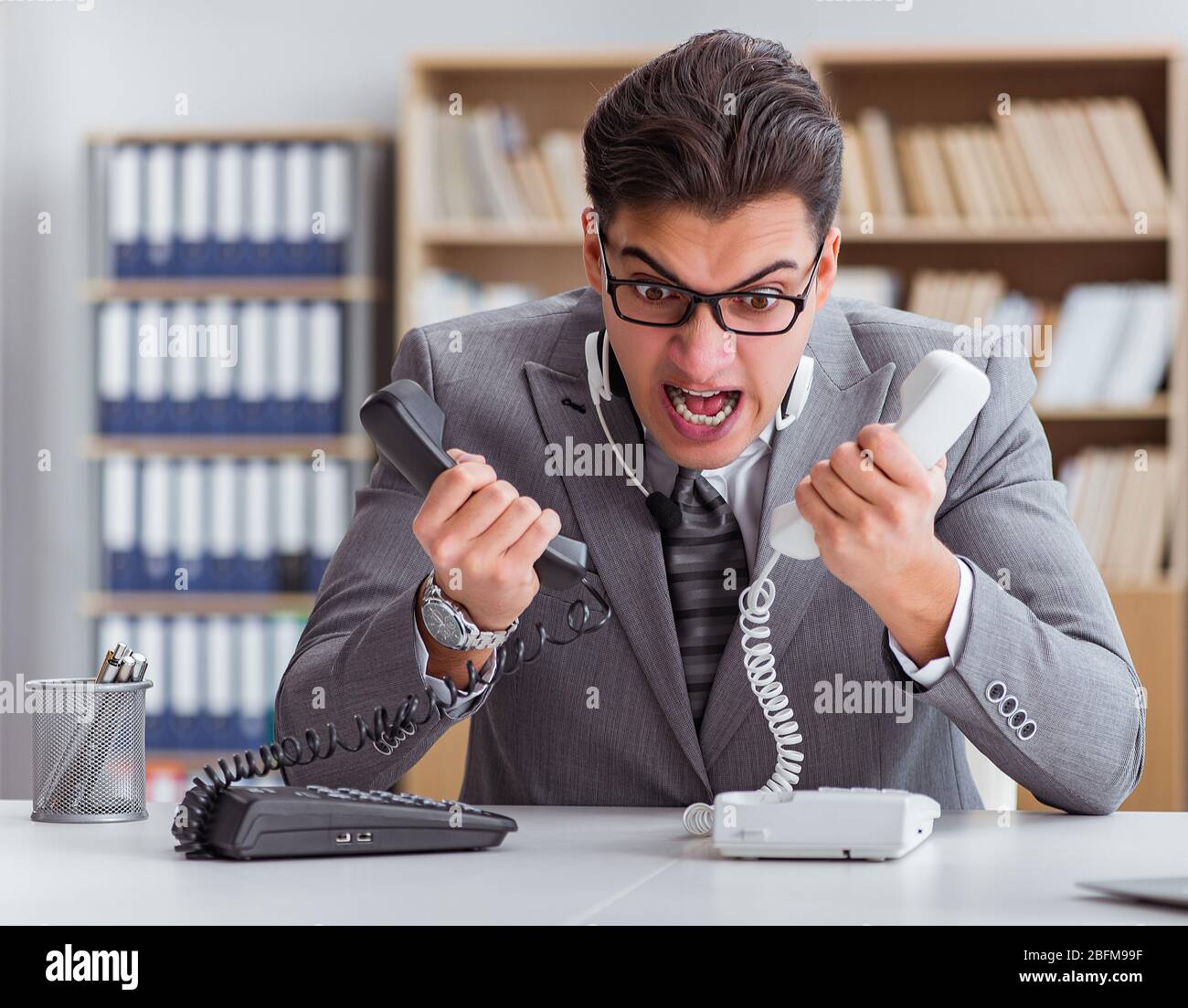 Angry helpdesk operator in hi-res stock photography and images - Alamy