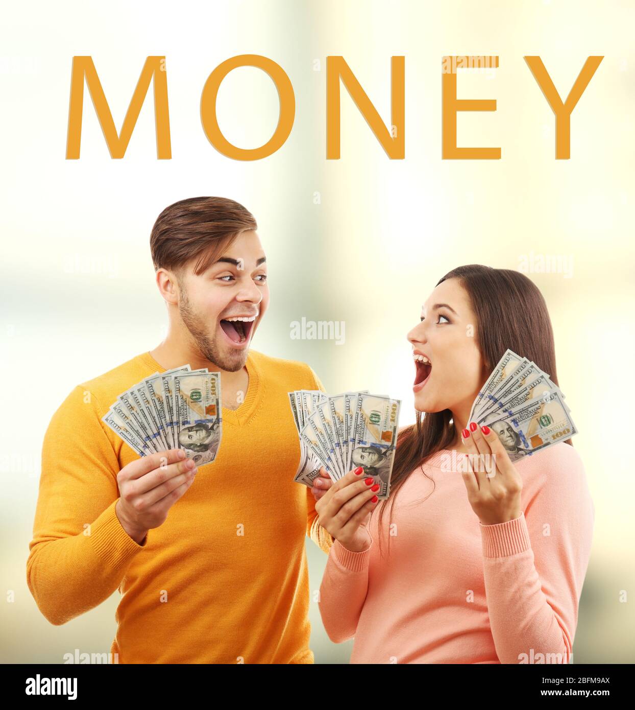 Couple with money banknotes on bright background Stock Photo - Alamy
