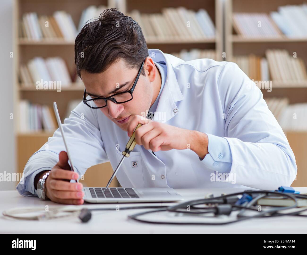 The it technician repairing broken laptop notebook computer Stock Photo ...