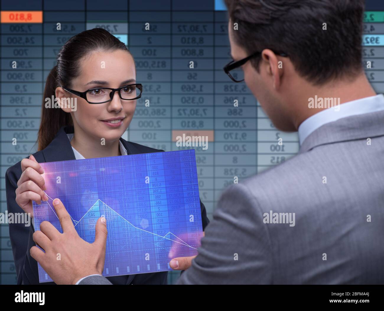 The business people discussing stock chart trends Stock Photo - Alamy