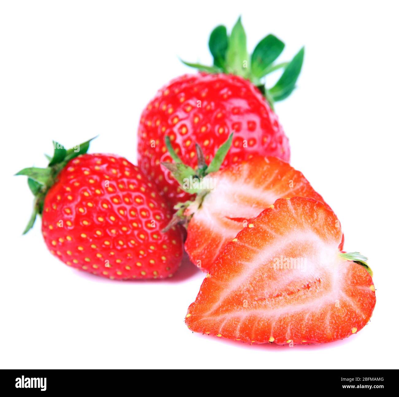 Ripe sweet strawberries in heart shape isolated on white Stock Photo ...
