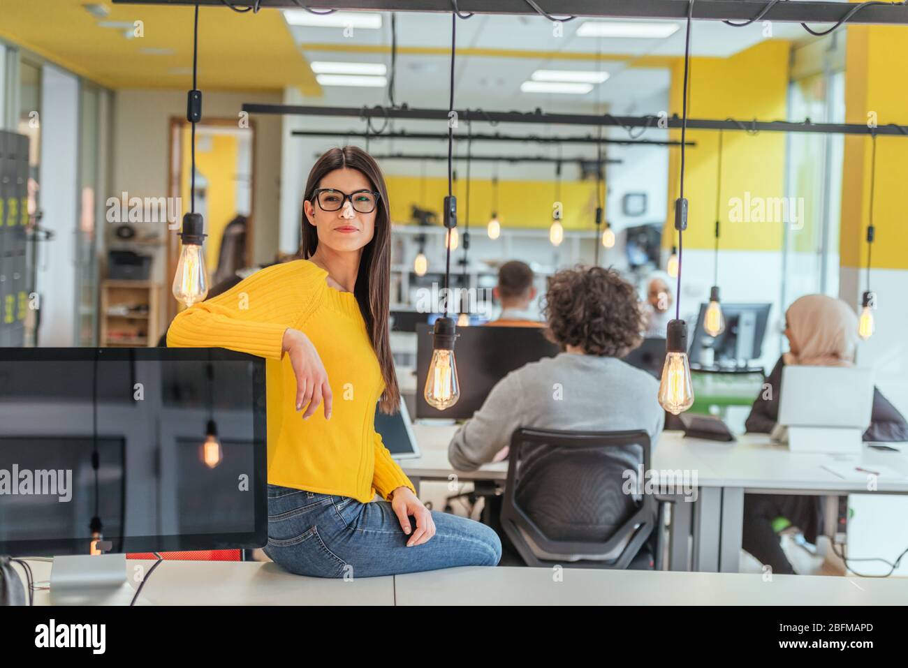 Female boss, manager executive posing in a modern startup office while ...